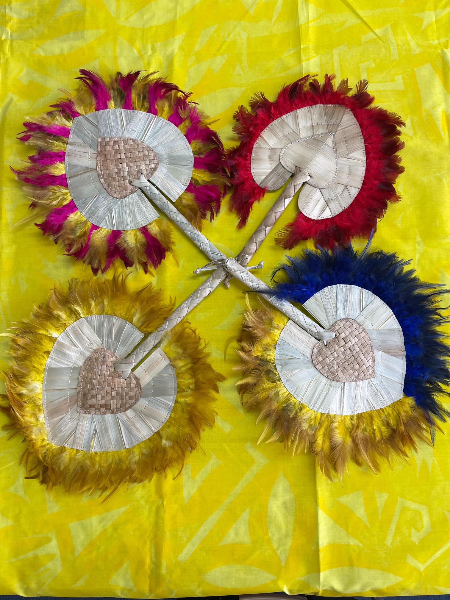 Feathered Fans: Traditional Island Accessory