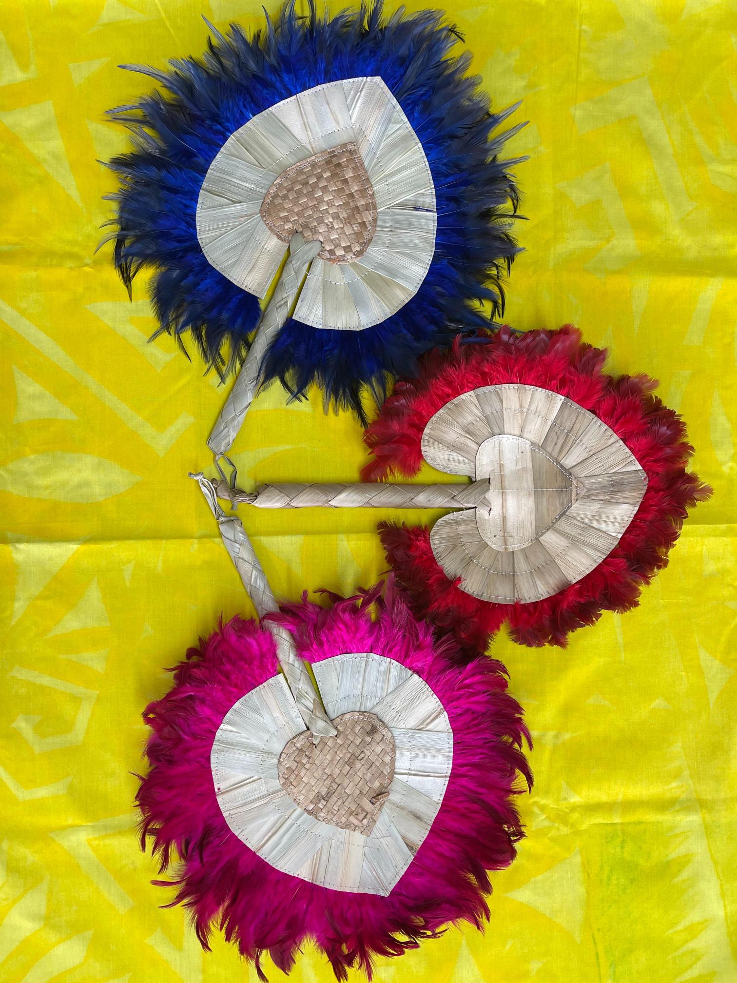 Feathered Fans: Traditional Island Accessory